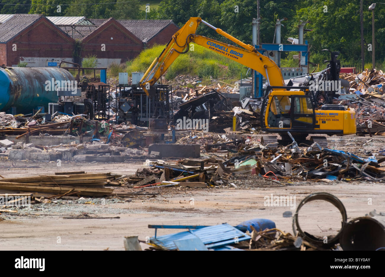 Excavators sorting scrap metal at demolition of former Whiteheads ...