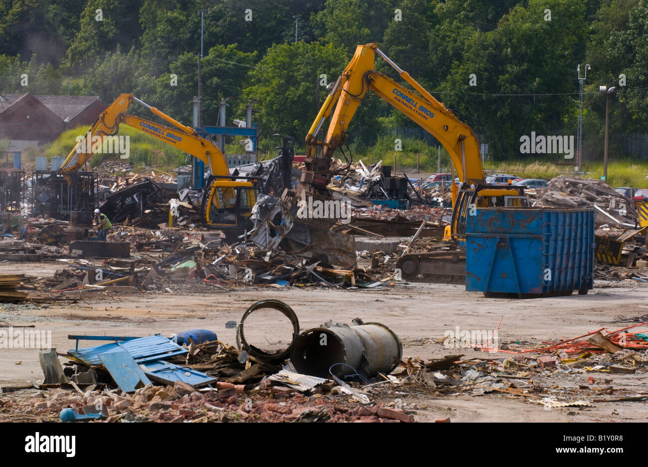 Excavators sorting scrap metal at demolition of former Whiteheads ...