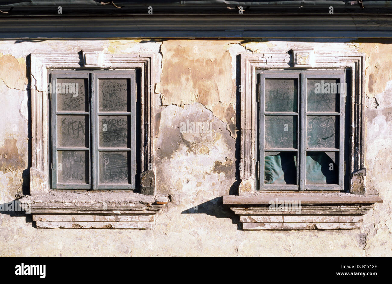 Broken street windows on the very old house Stock Photo - Alamy