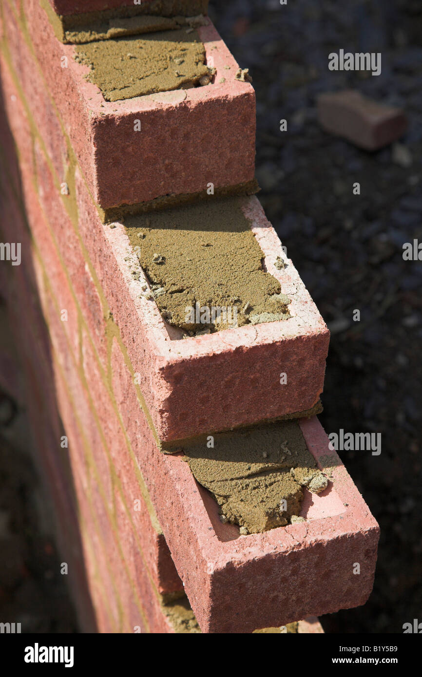 Construction of a new wall Stock Photo - Alamy