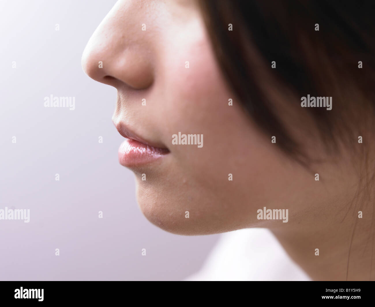 Side view of sweet face, cropped Stock Photo - Alamy