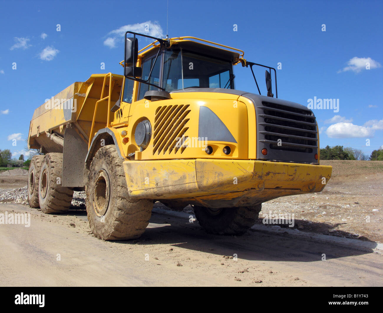 Giant Yellow Dump Truck Stock Photo - Alamy