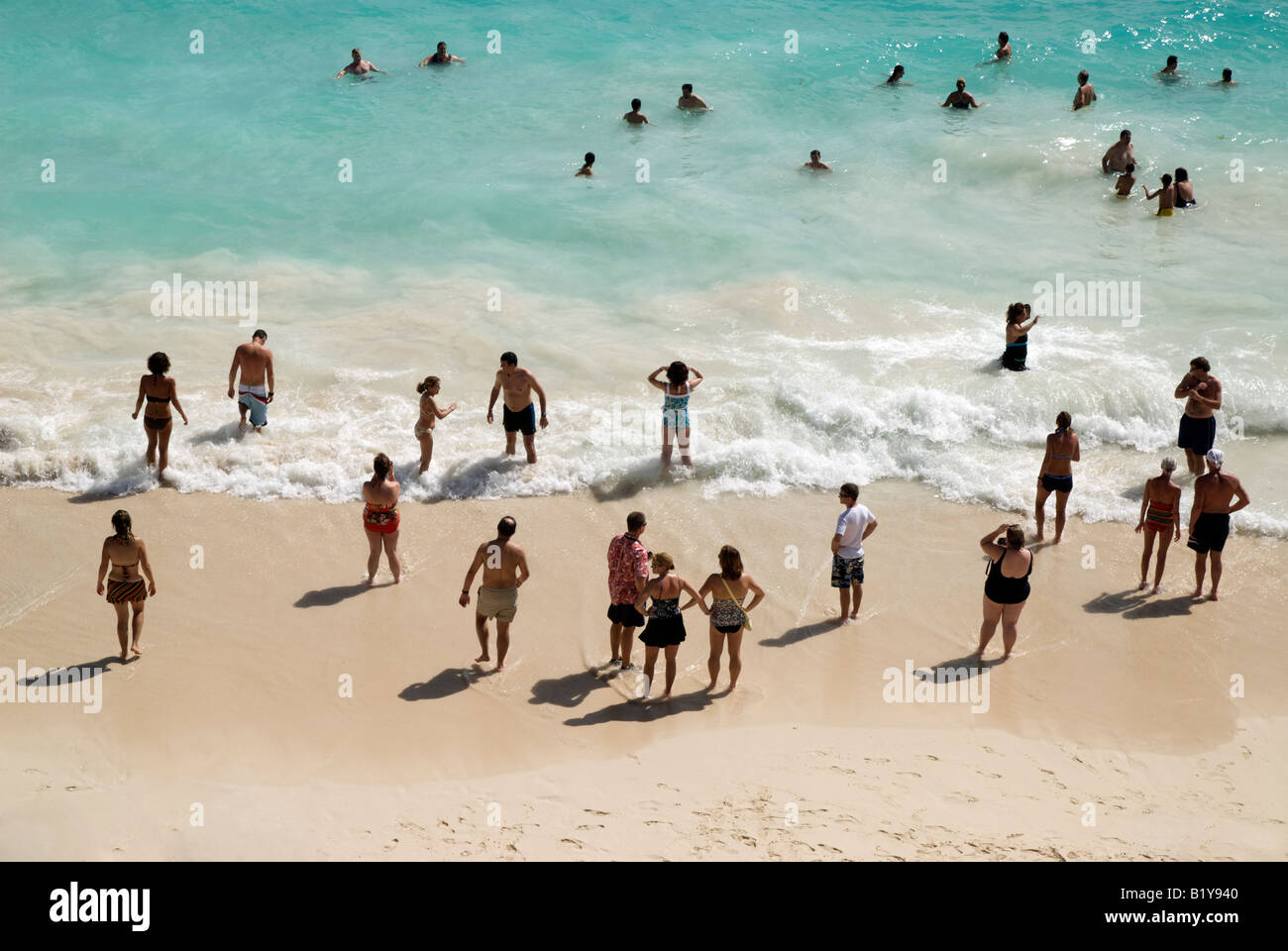 Crowded tropical beach Stock Photo - Alamy