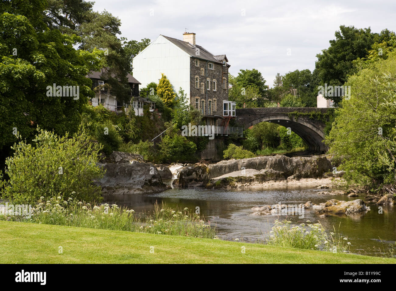 UK Wales Powys Rhayader old waterfall on River Wye below bridge Stock ...