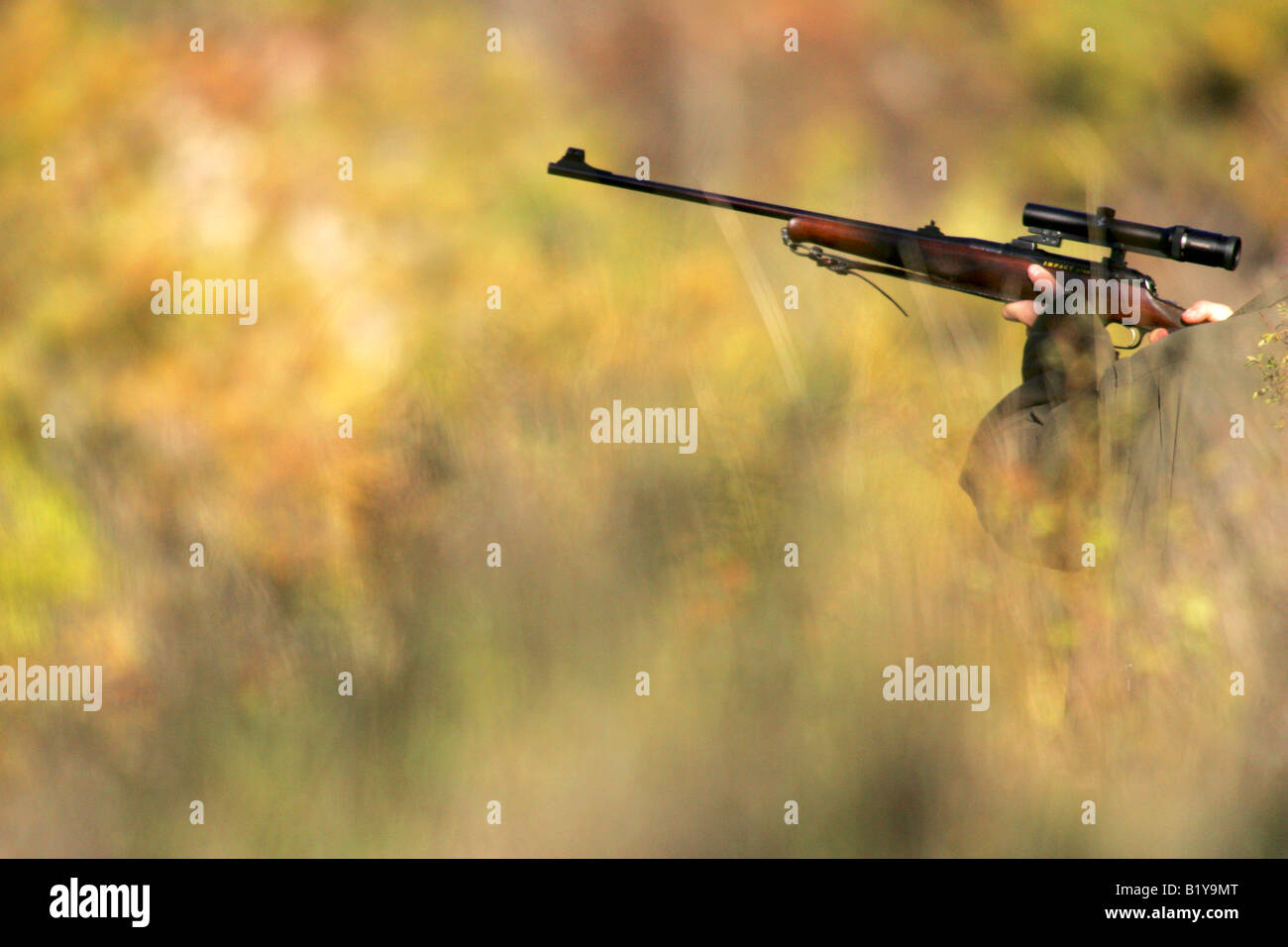 hunter with a gun Stock Photo - Alamy