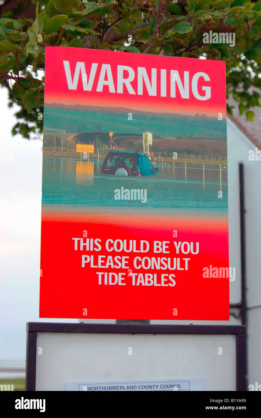 Fast Tide Warning Sign on Holy Island / Lindisfarne Stock Photo - Alamy