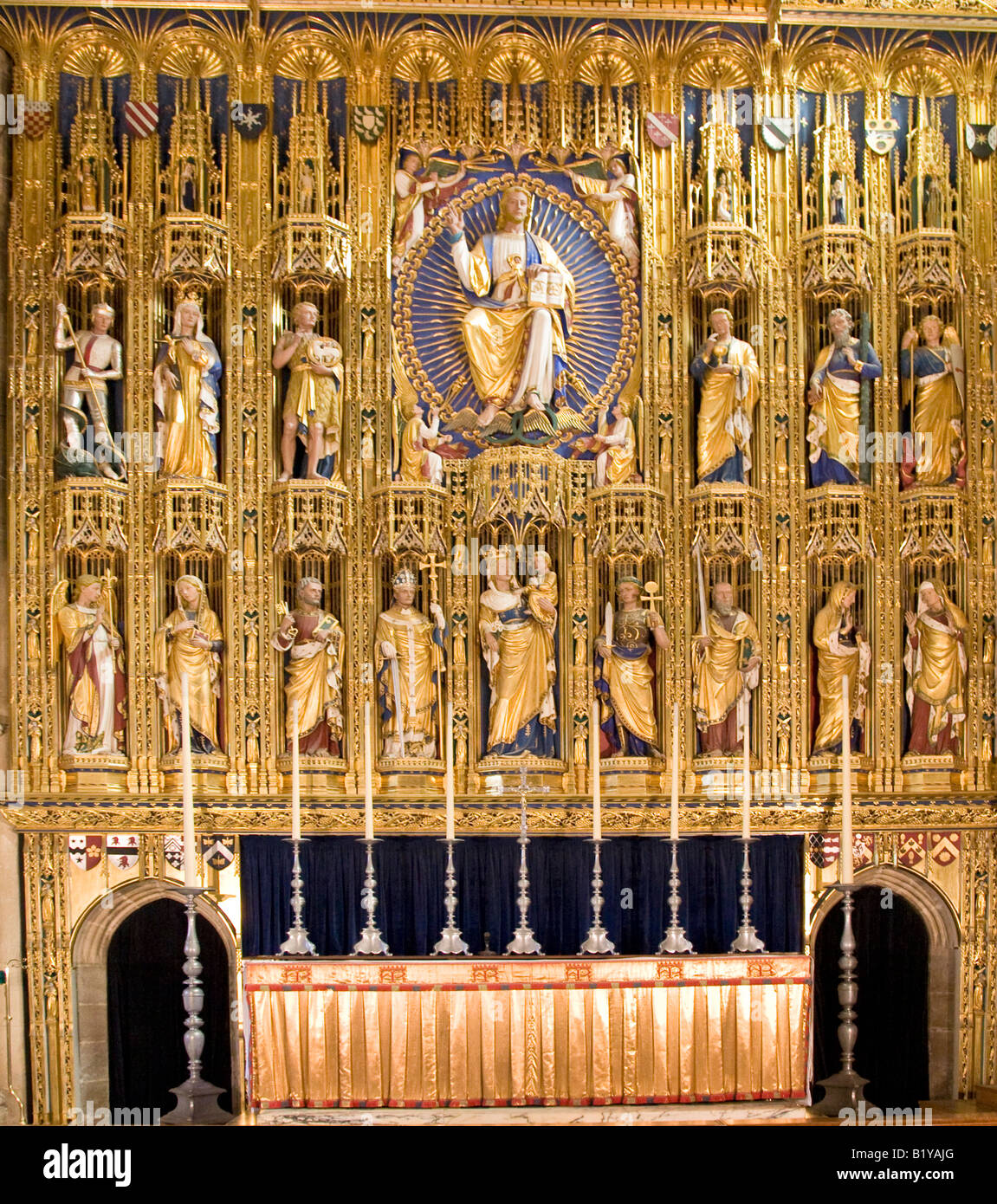 The guilded altar screen at Wymondham Abbey Norfolk England Stock Photo ...