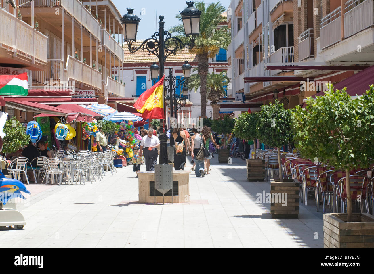Shops, cafes & bars on a street in Los Alcazares, Murcia, Costa Calida ...