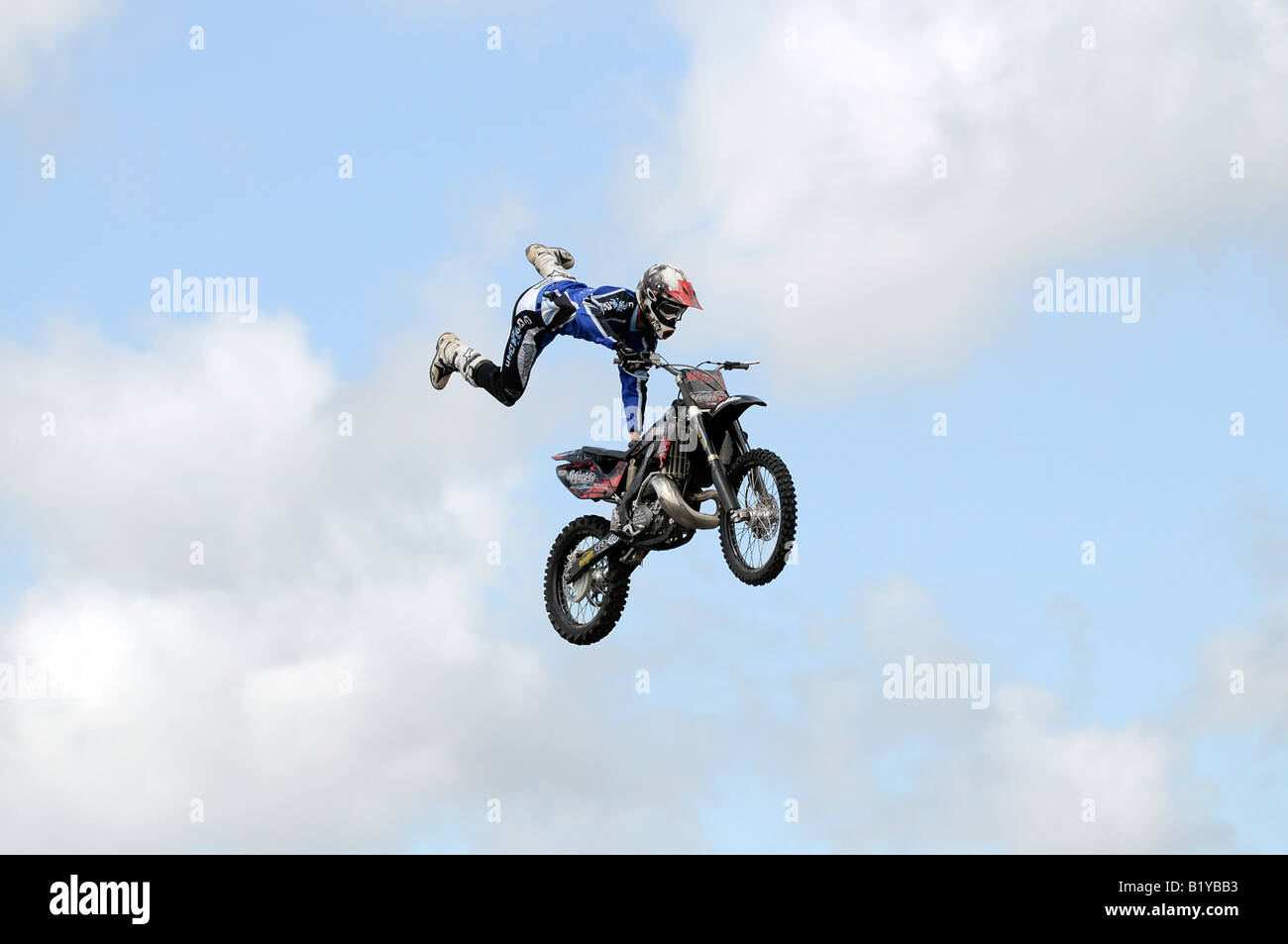 Freestyle motocross stunt rider Stock Photo - Alamy