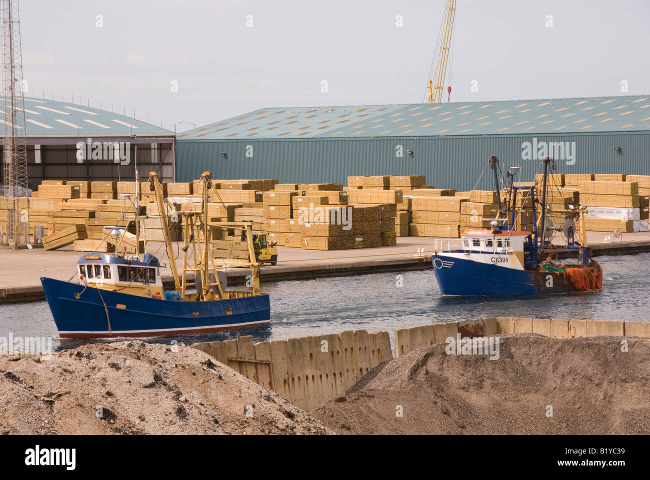 Wood imports at Shoreham port, Sussex, England Stock Photo - Alamy