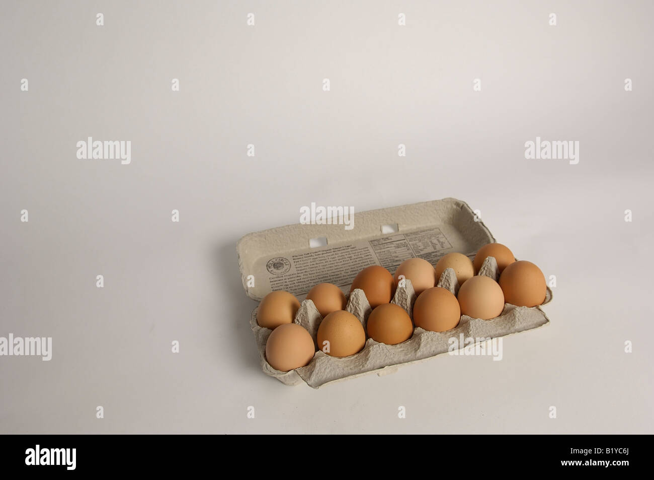Dozen brown eggs on hi-res stock photography and images - Alamy
