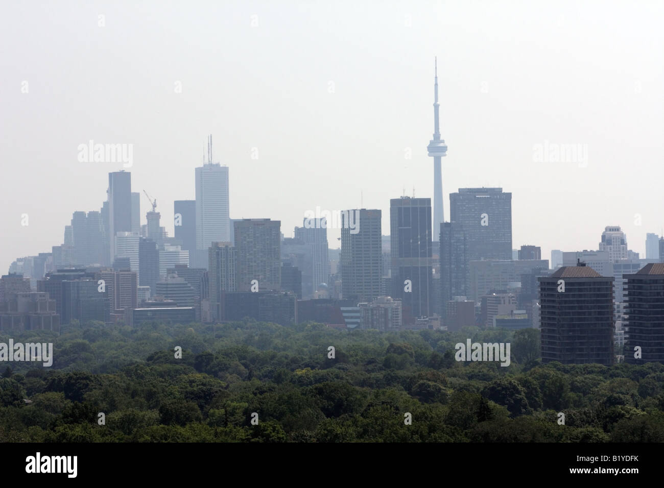 Toronto Downtown fading in smog at 2:45 pm under smog advisory issued ...