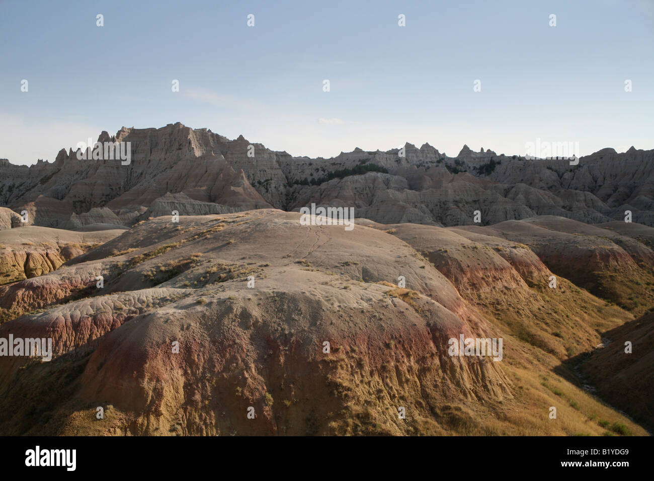 A view of The Badlands South Dakota in summer showing a stark landscape ...