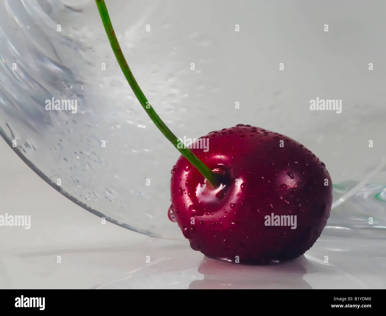 Cherry splashing white in water hi-res stock photography and images - Alamy
