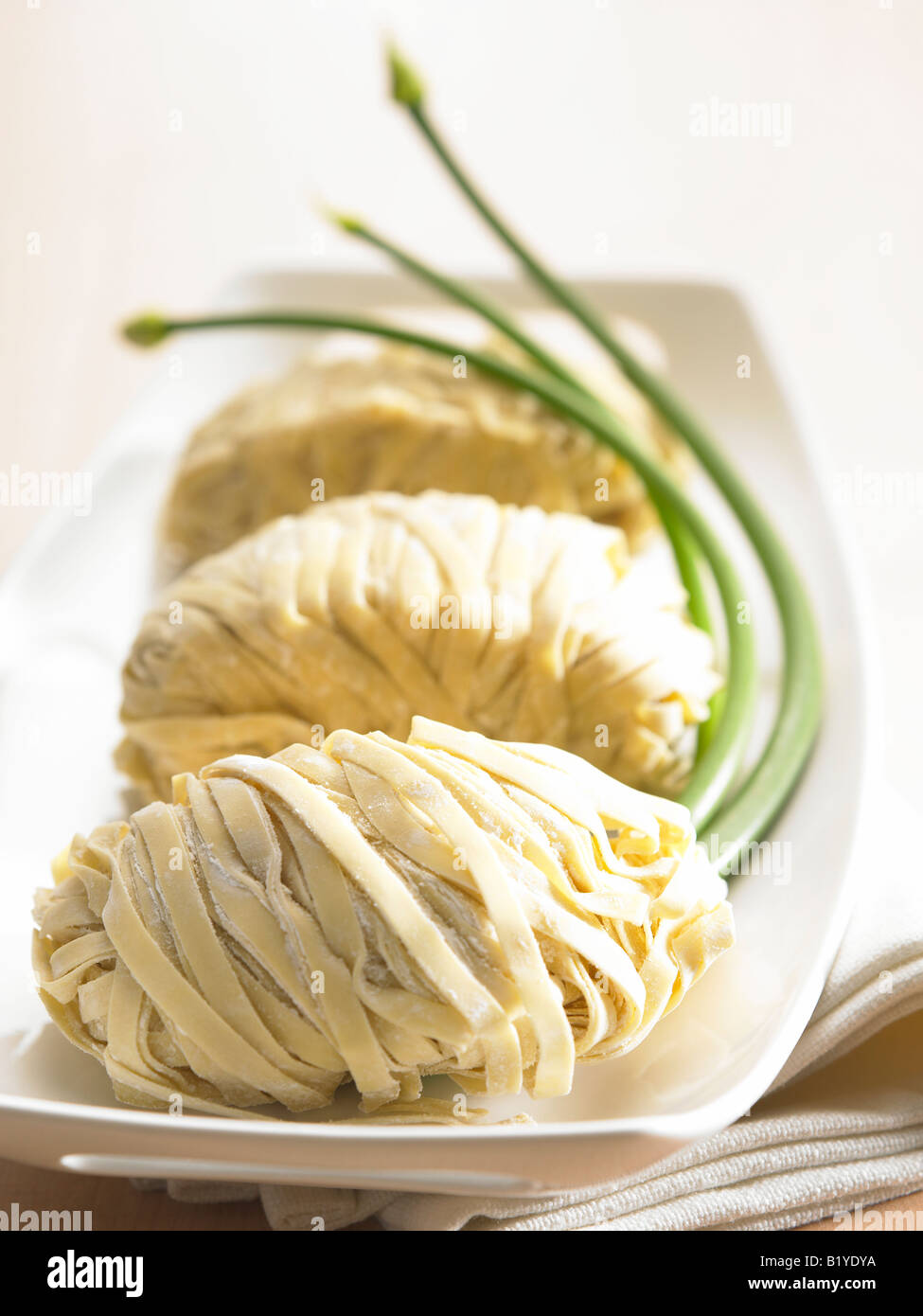 three chinese noodle in a row Stock Photo - Alamy