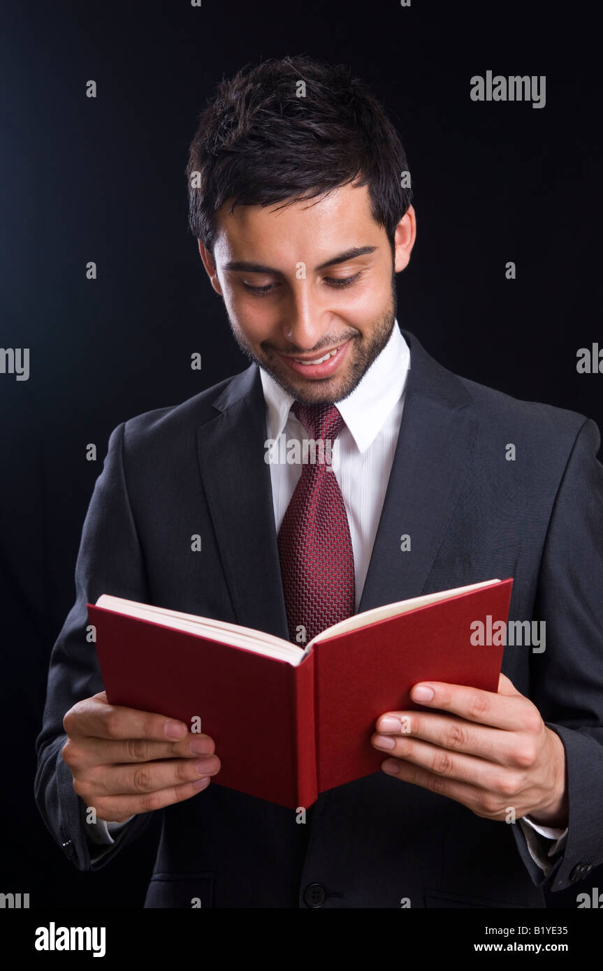 Pakistani man reading hi-res stock photography and images - Alamy