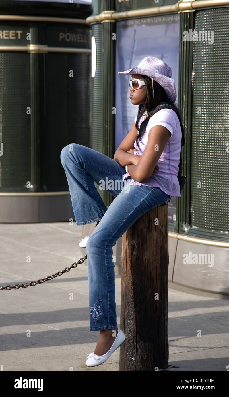 Single black girl waiting Stock Photo - Alamy