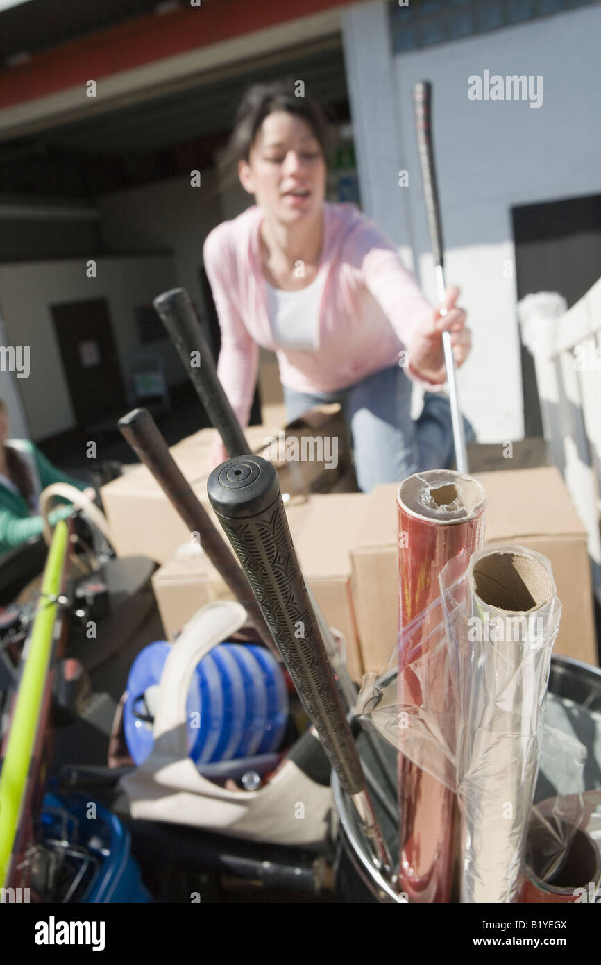 Woman loading furniture Stock Photo - Alamy