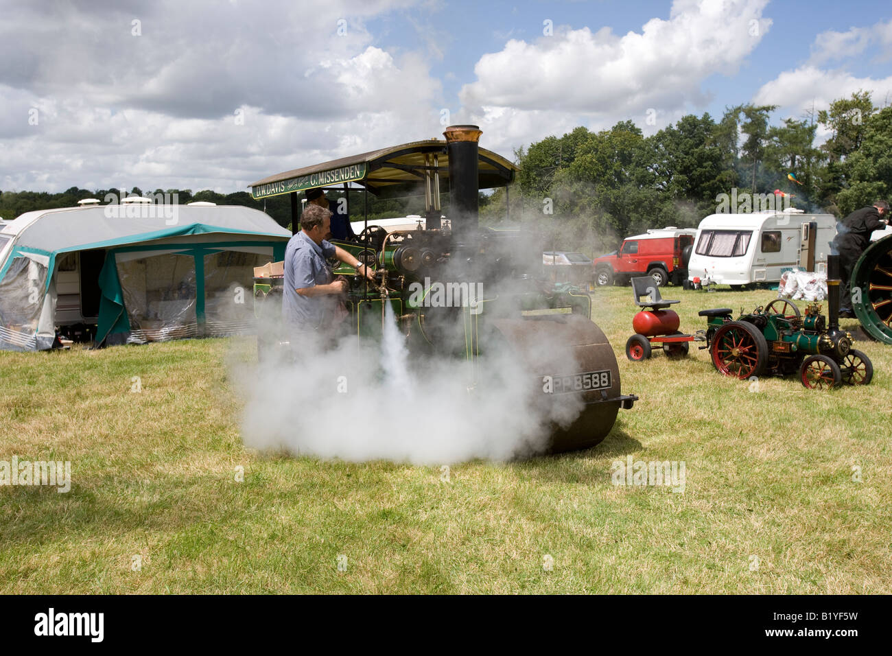 Prestwood Steam Rally. steam roller/tractor being used. releasing steam ...