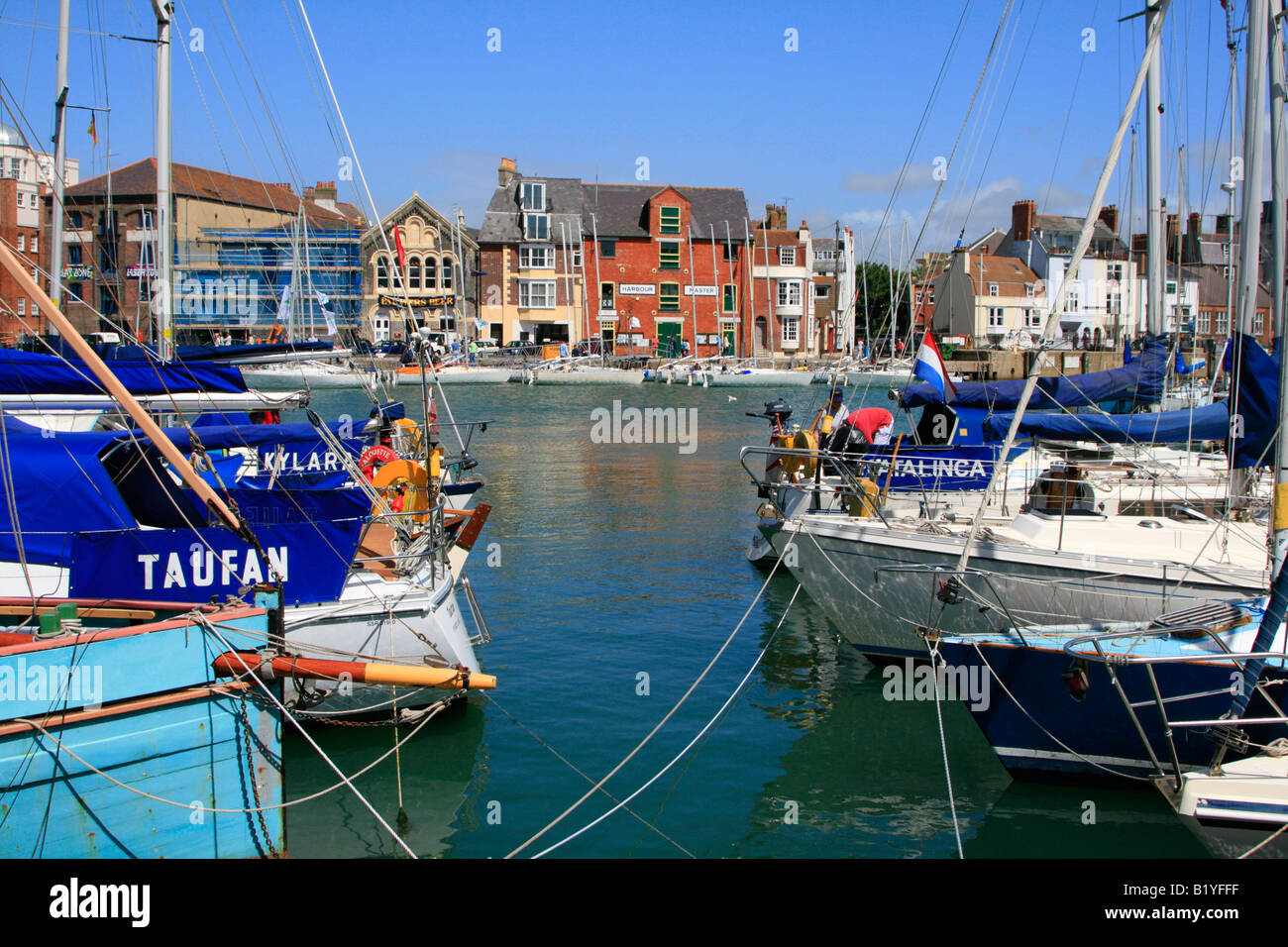 weymouth harbour quayside boats yachts summer dorset england uk gb ...
