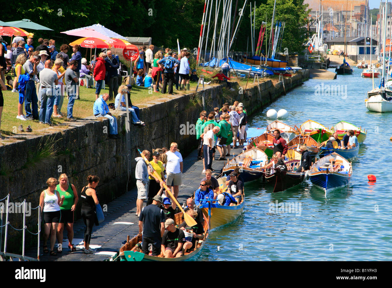 weymouth rowing club hosting gig rowing boat racing event summer ...
