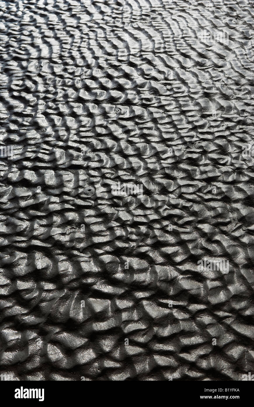 Wet rippled sand hi-res stock photography and images - Alamy