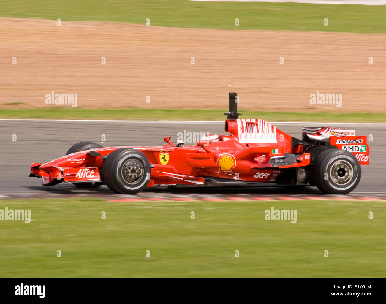 Kimi Raikkonen driving a Ferrari F1 car at Silverstone Stock Photo - Alamy