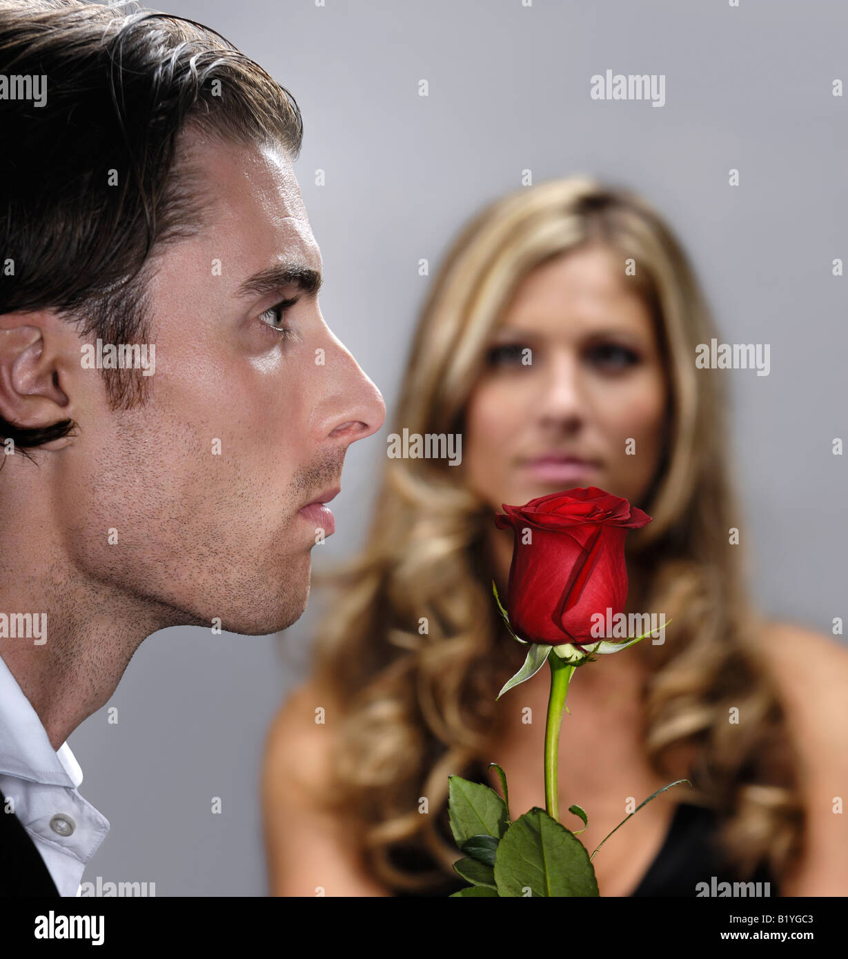 Man with a Rose Stock Photo - Alamy