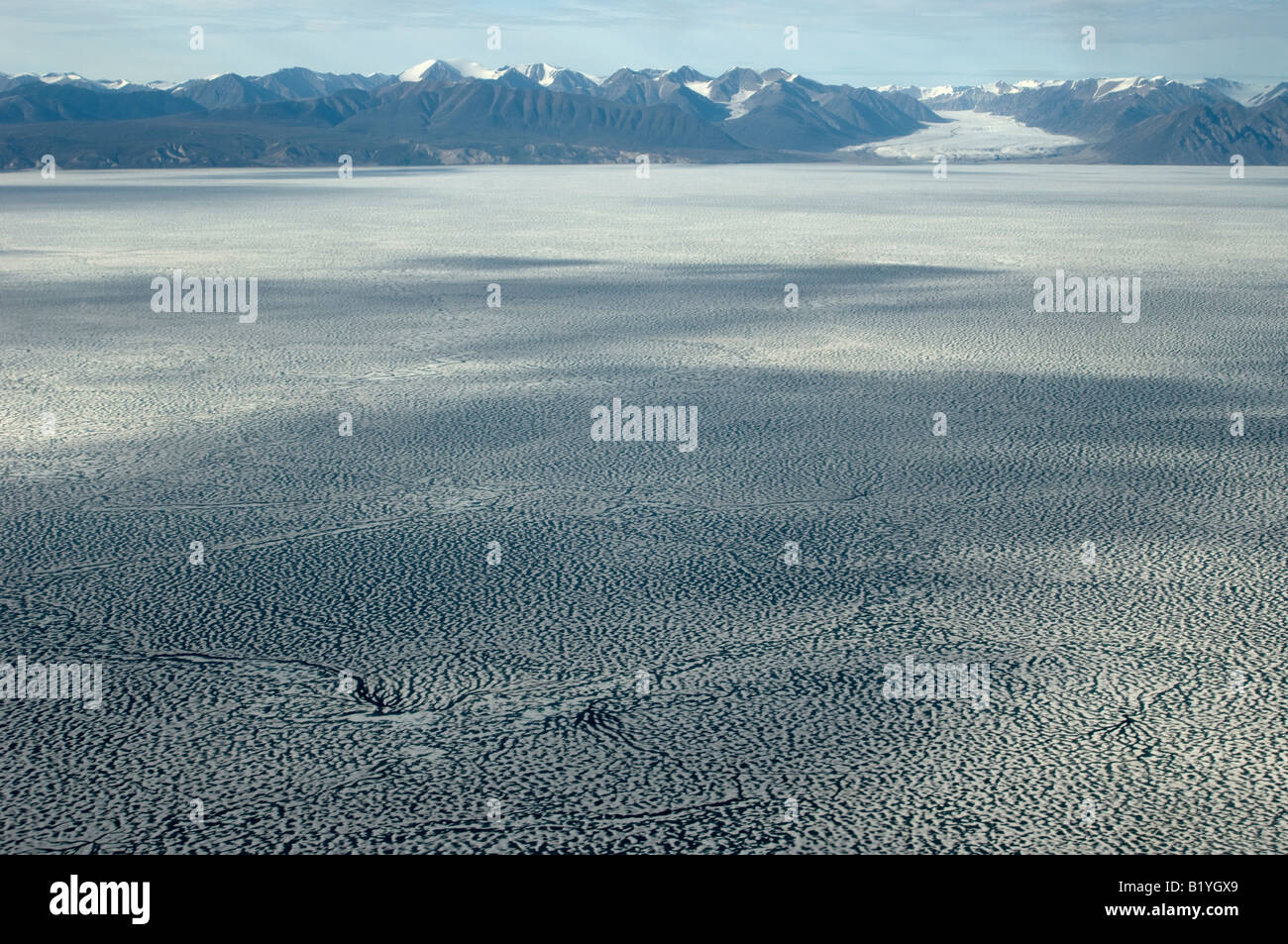 Landscape view of the ice break up and the glacier flow and mountains ...