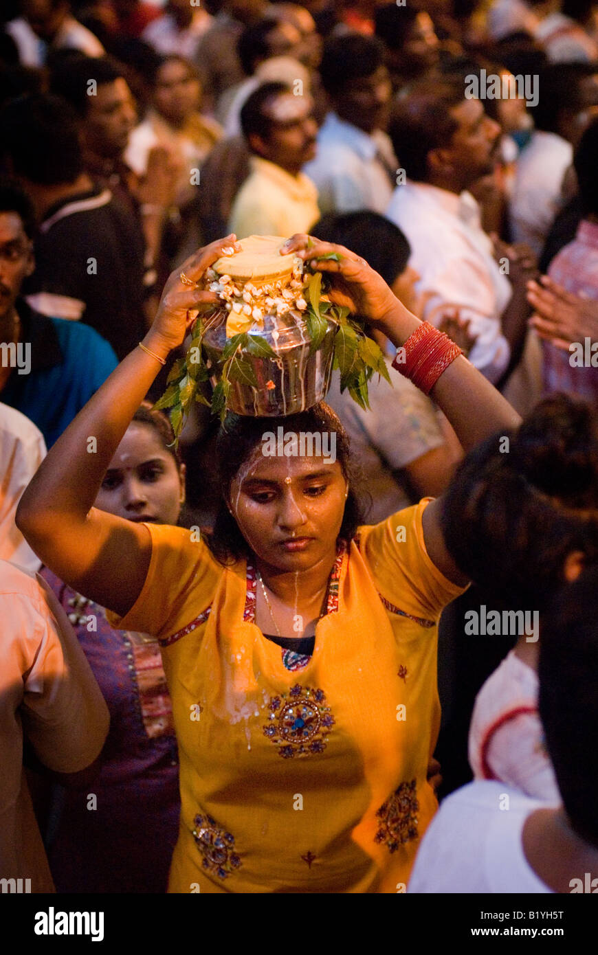 Indian woman carrying milk pot hi-res stock photography and images - Alamy