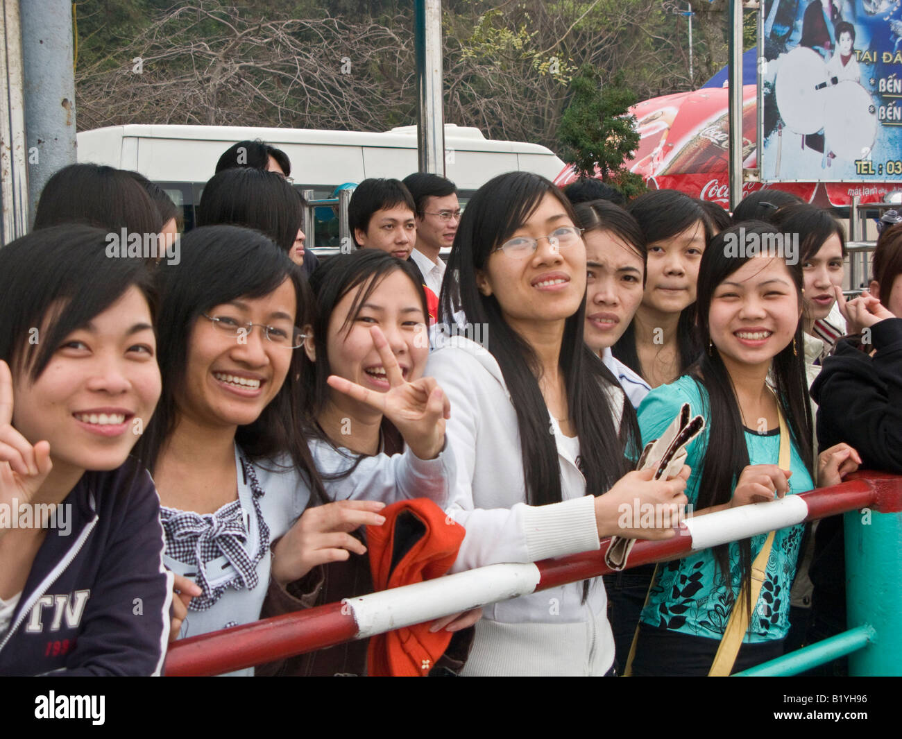 Vietnamese students waiting for boat trip at Halong Bay, Vietnam Stock ...