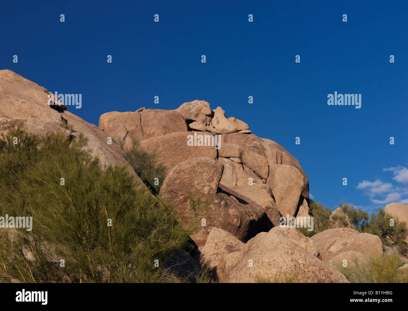 Boulders in the Arizona desert north of Scottsdale against a brilliant ...