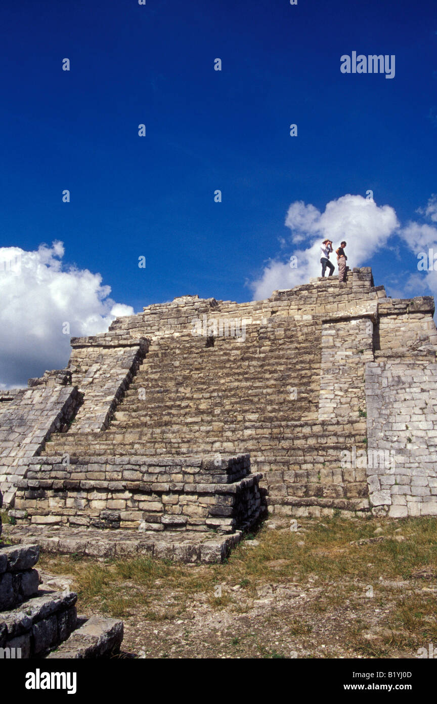 Tourists on top of the Acropolis the main structure at at the Mayan ...