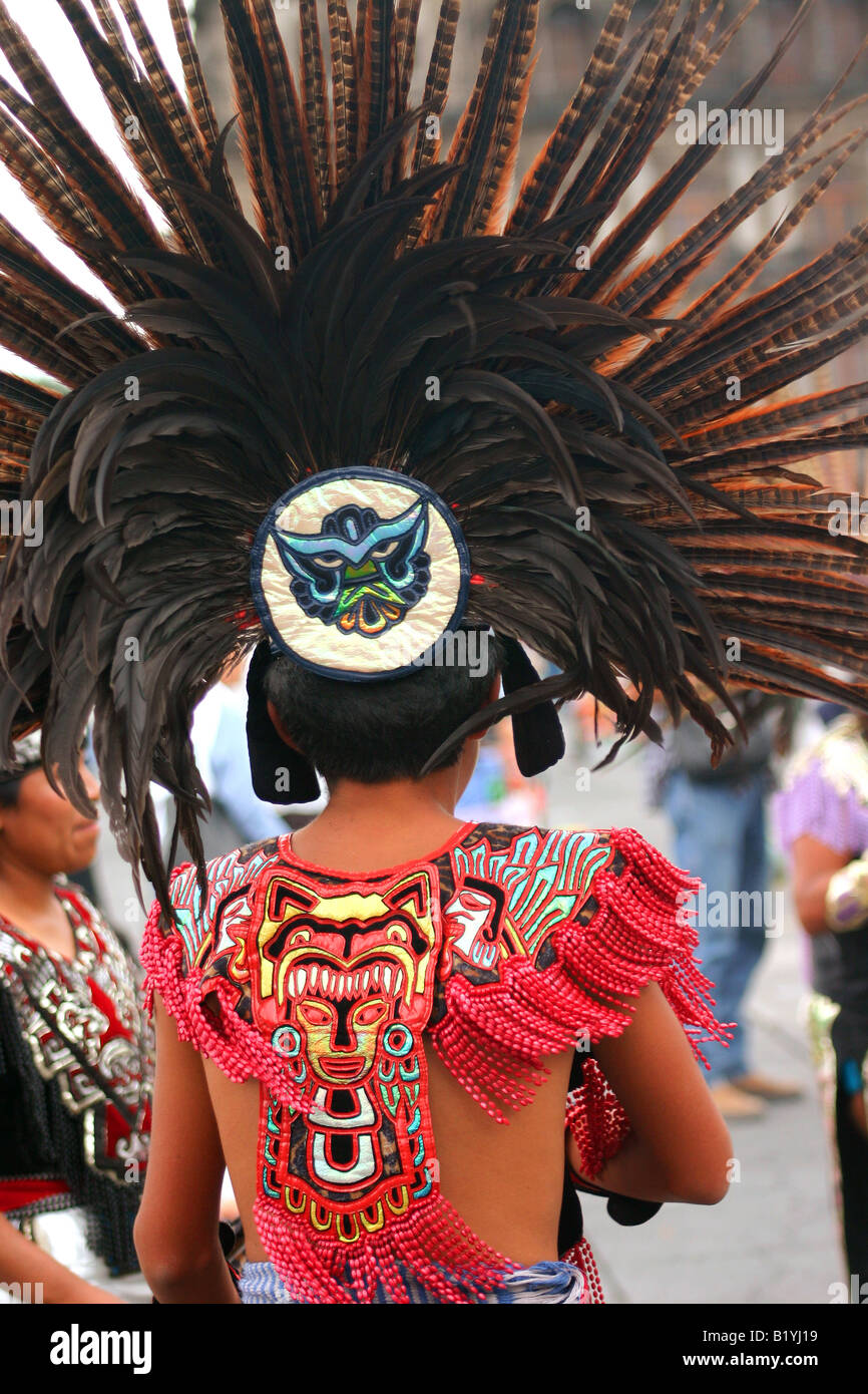 Mexican indian performing a traditional dance outdoors on the streets ...