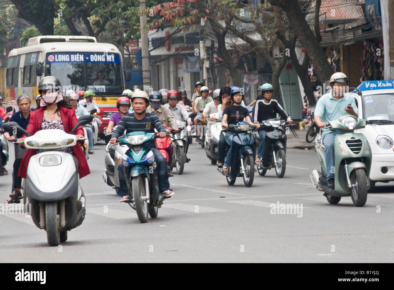 motorbike traffic in busy street in Hanoi, Vietnam Stock Photo - Alamy