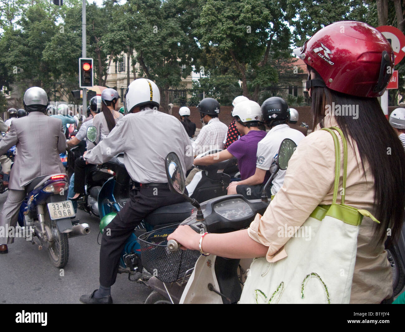 motorbike traffic in busy street in Hanoi, Vietnam Stock Photo - Alamy