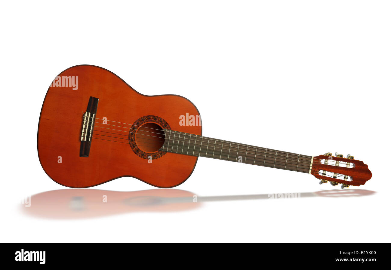 Guitar An acoustic six string guitar isolated by a plot a background ...