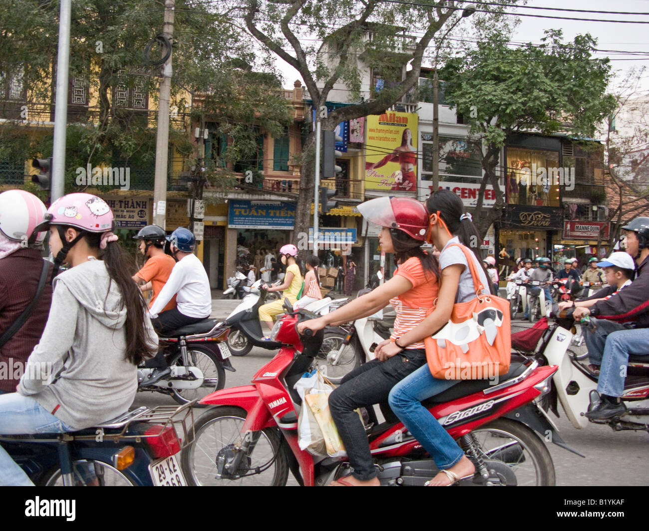 motorbike traffic in busy street in Hanoi, Vietnam Stock Photo - Alamy