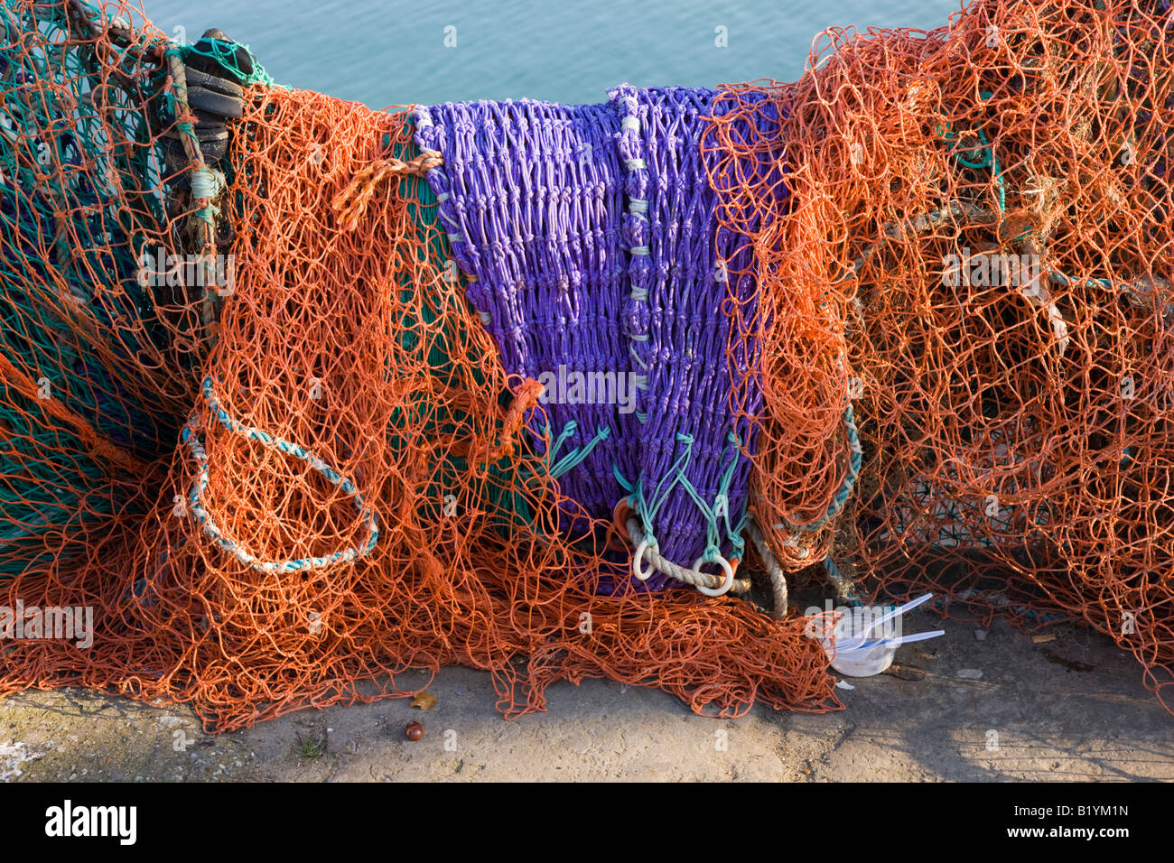 Fishing nets hanging up dry hi-res stock photography and images - Alamy