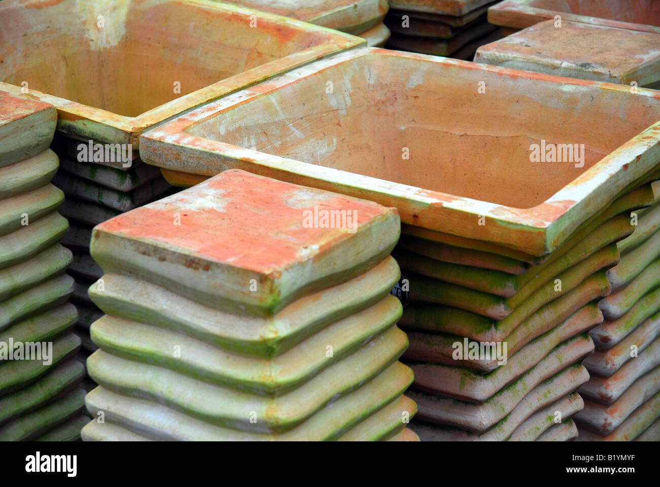 Stacked earthen pots hi-res stock photography and images - Alamy