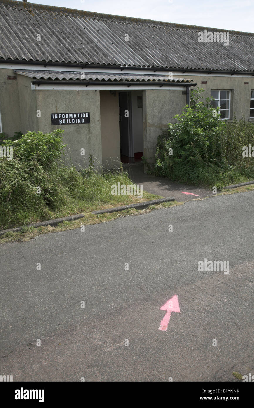 Red arrow points direction to door of old military building Orford Ness ...