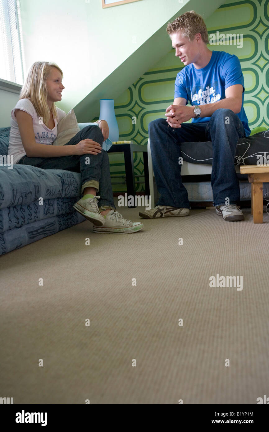 Brother and sister talking Stock Photo - Alamy