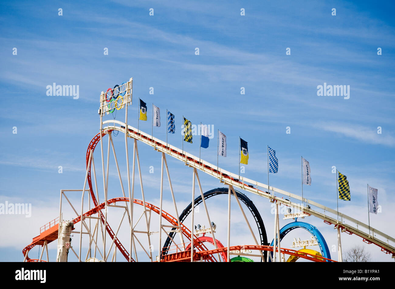 Colorful roller coaster ride at German Volksfest, Nuernberg, Germany ...