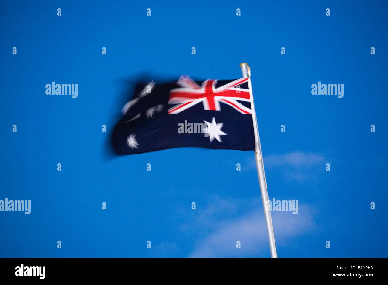 Australian flag waving in wind hi-res stock photography and images - Alamy