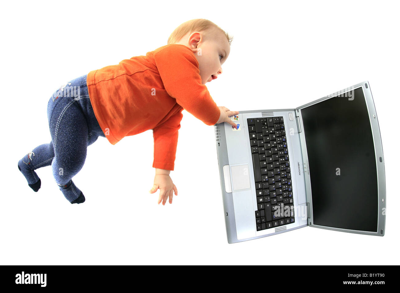 baby playing with laptop Stock Photo - Alamy