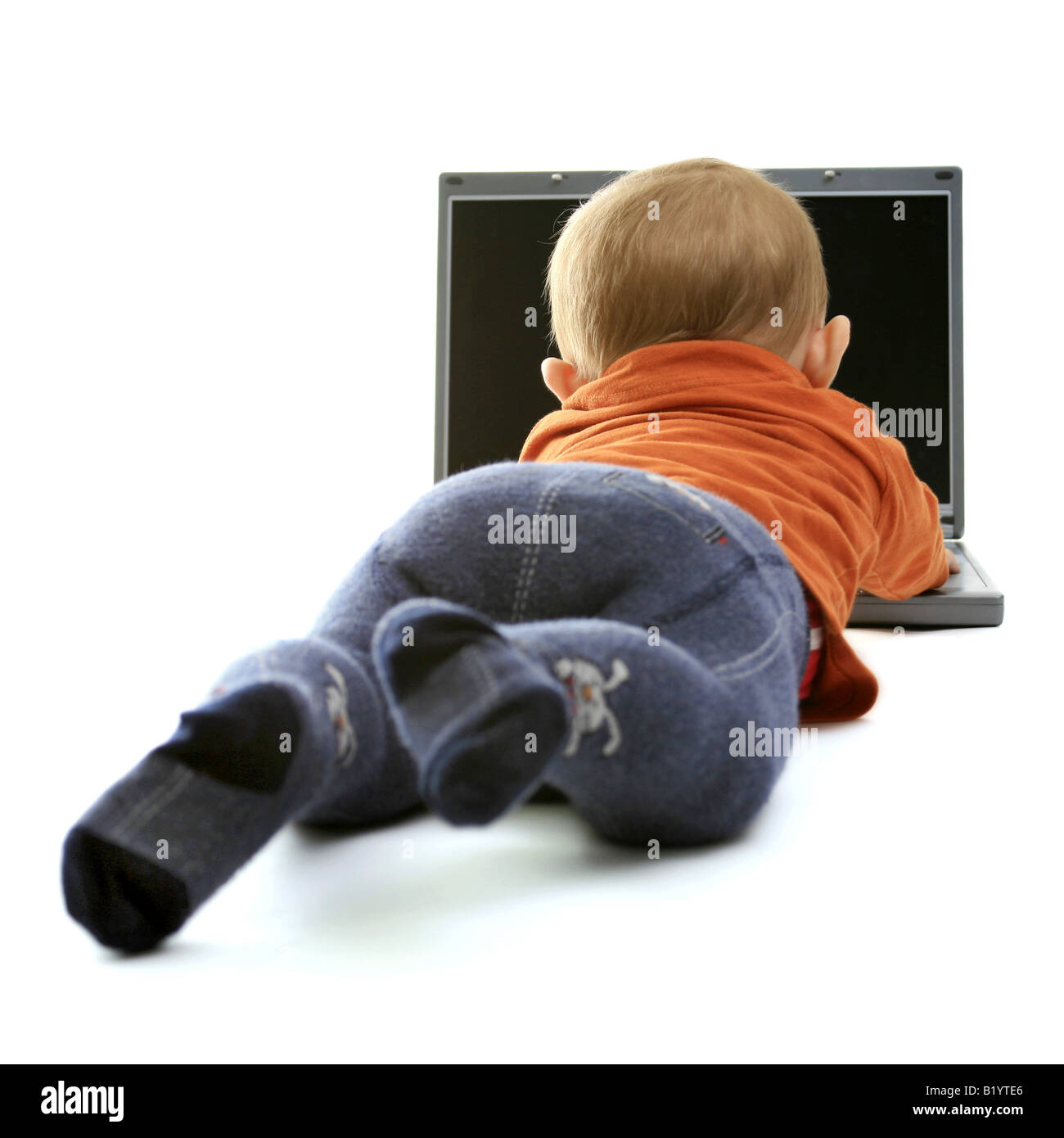 baby playing with laptop Stock Photo - Alamy