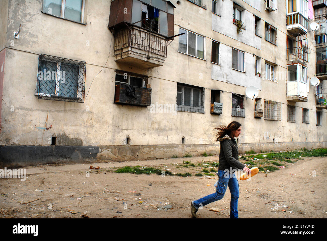 a romanian girl with bread, ferentari neighborhood Stock Photo - Alamy