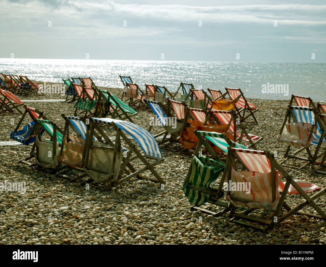 Deck chairs on the beach Stock Photo - Alamy