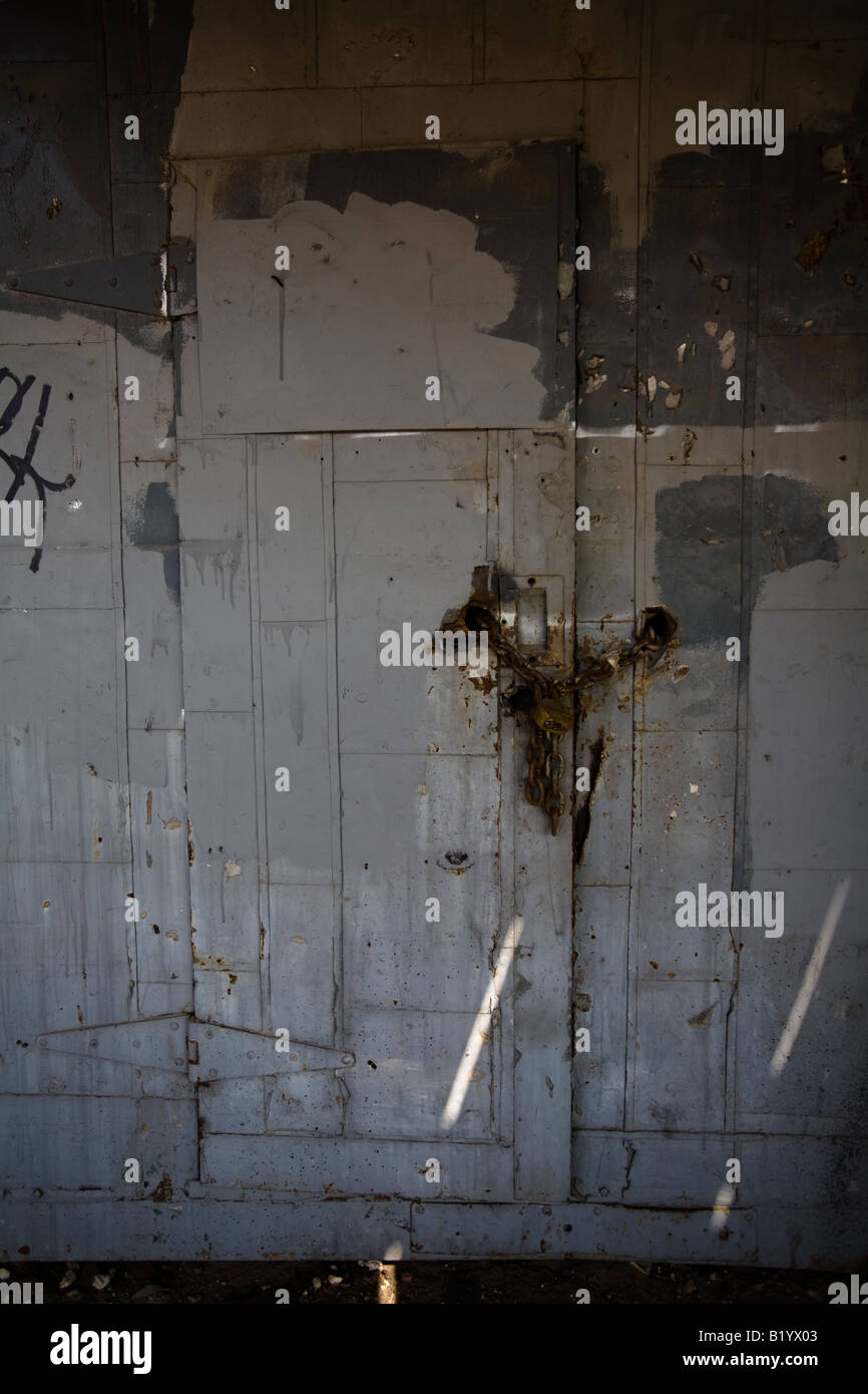 Old door closed with chain Stock Photo - Alamy