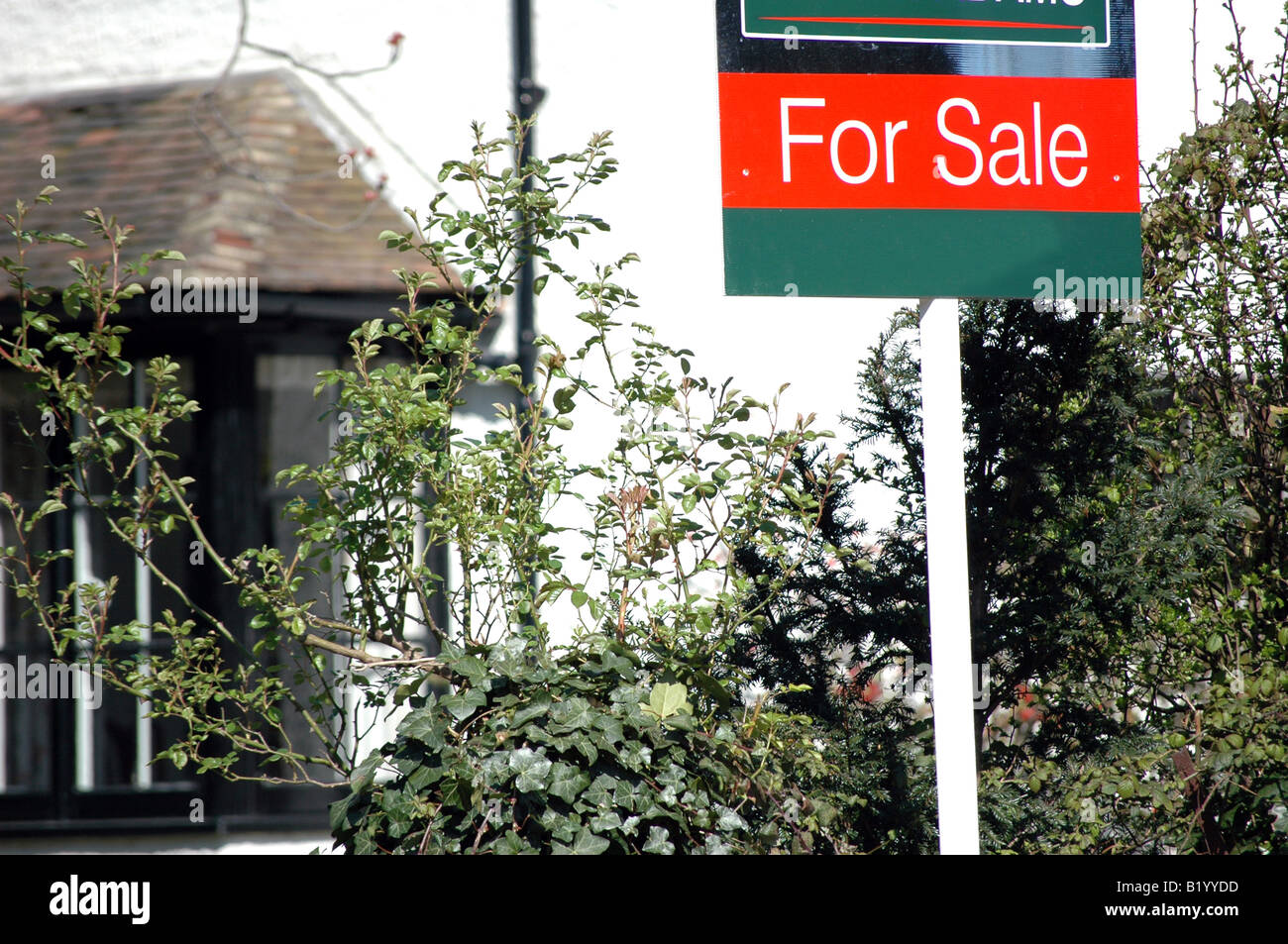 Royalty free photograph of for sale sign outside house in London street ...
